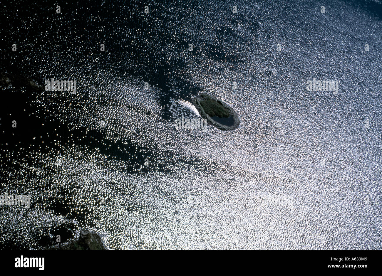 round stone fort in the middle of an irish lake, connemara, ireland ...