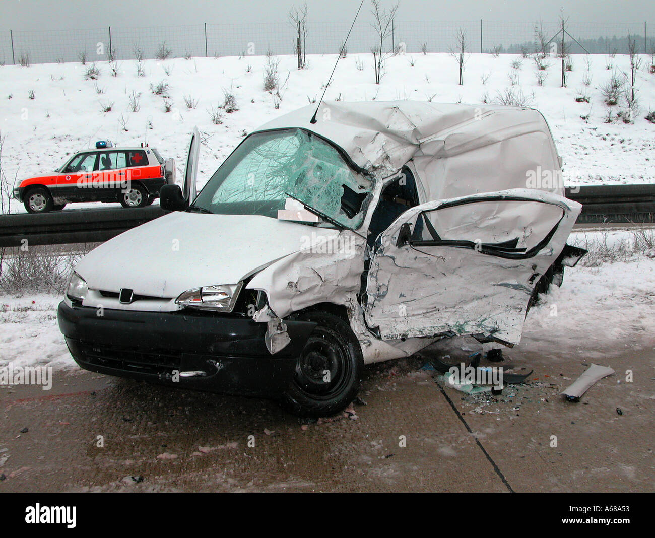 Crashed car on the highway Stock Photo - Alamy