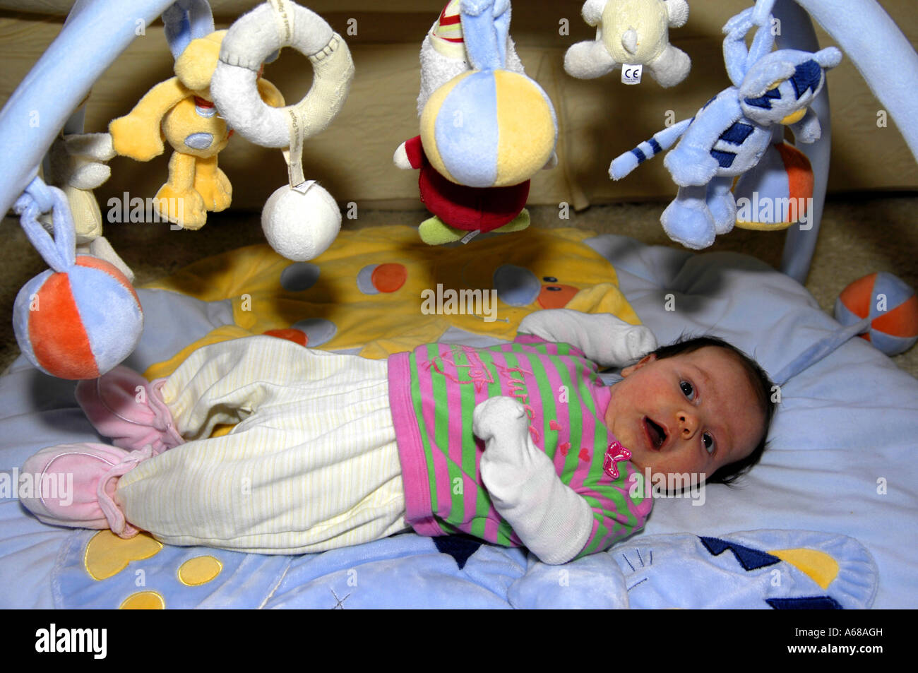 baby two months caucasian colour color horizontal play gym mobile toys ...