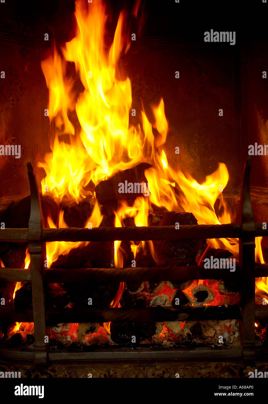 Close-up of a log fire in traditional grate in a domestic home Stock ...