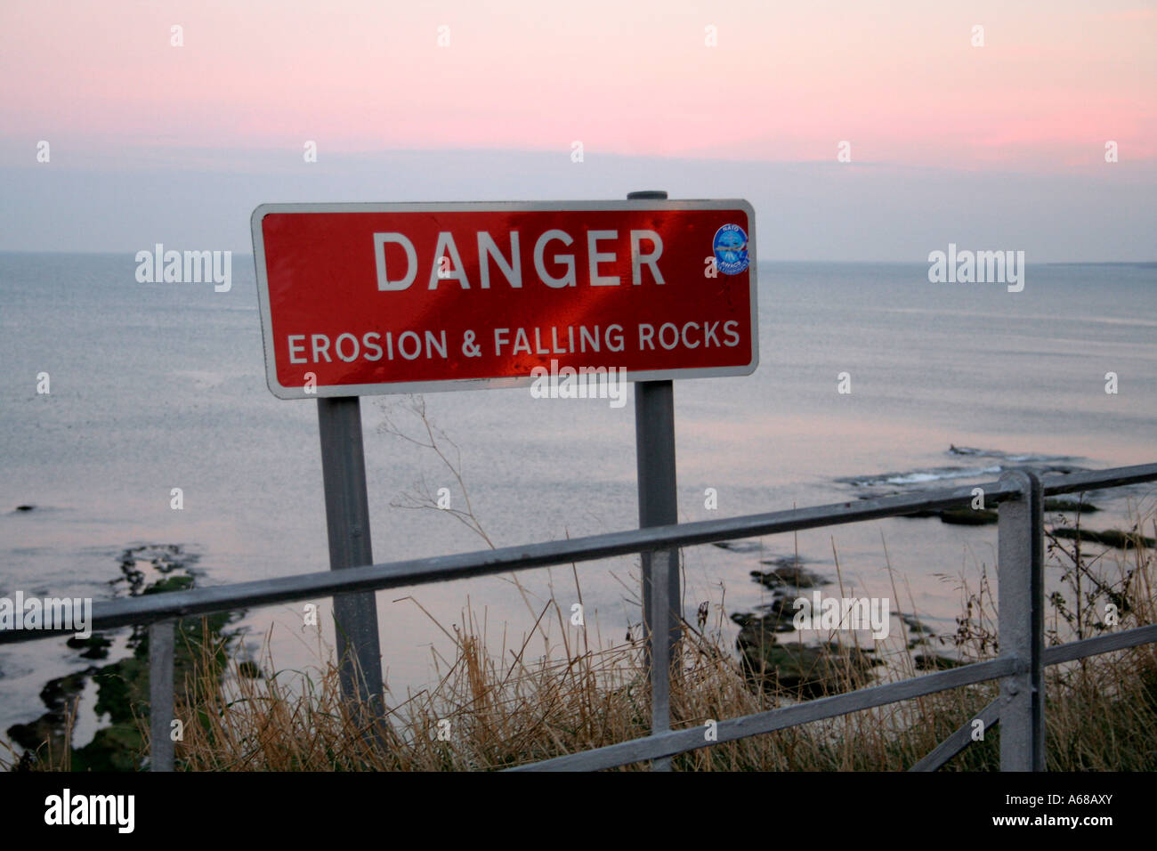 Danger Erosion and Falling Rocks sign. Taken near St Andrews Castle, St ...