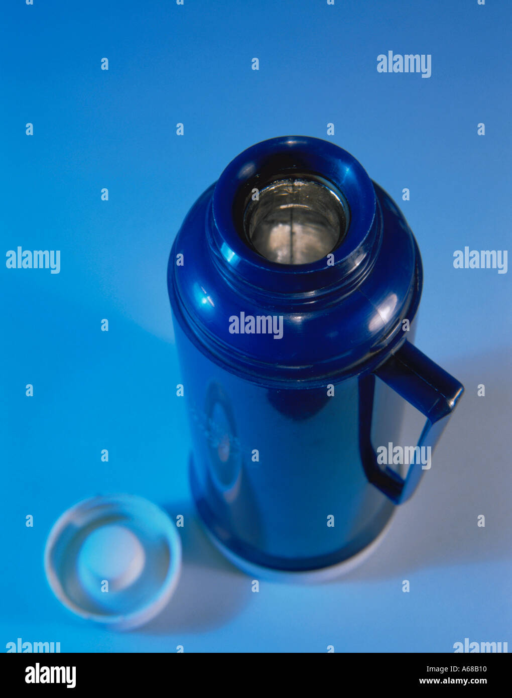 Glass vacuum flask in a plastic jacket Stock Photo - Alamy