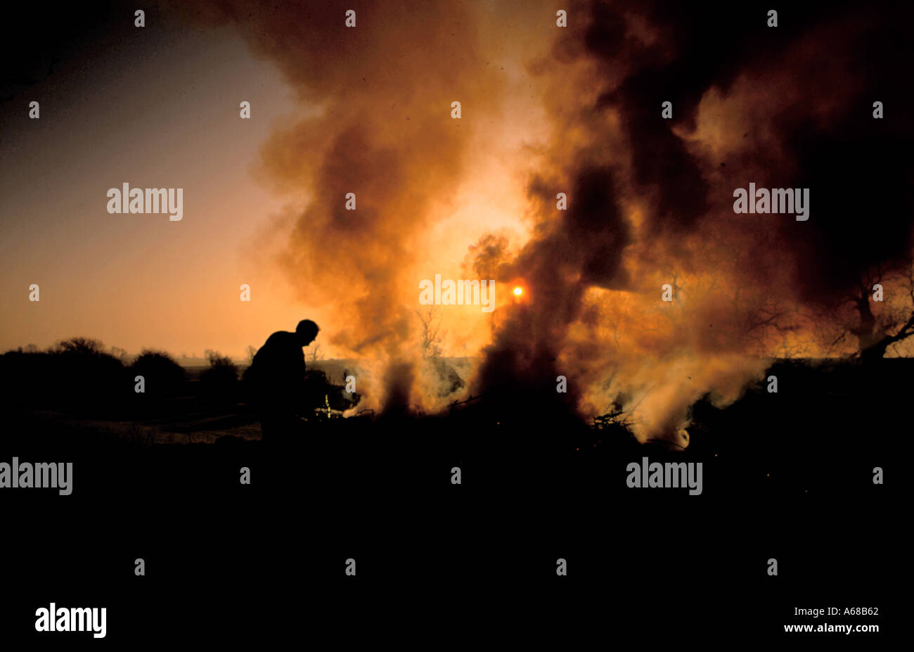 Burning fly tipped rubbish, near Richmond, North Yorkshire, England, UK ...