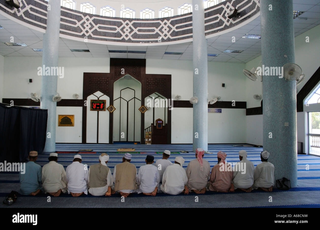 Muslim men praying in a mosque in Malaysia Stock Photo - Alamy