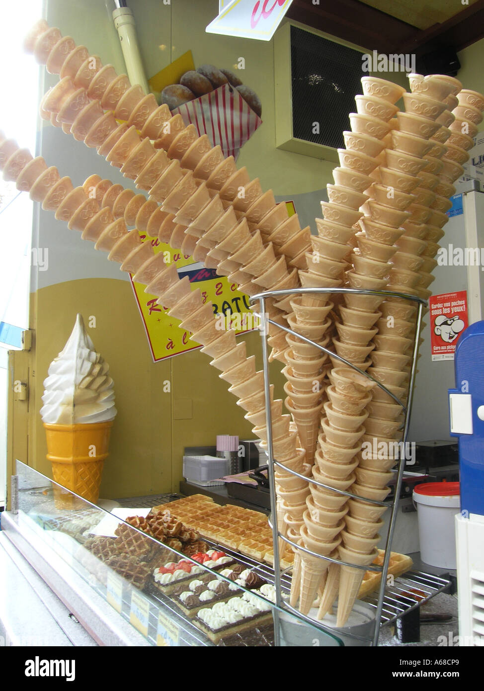 Stack of empty ice cream cones at fun fair Stock Photo - Alamy