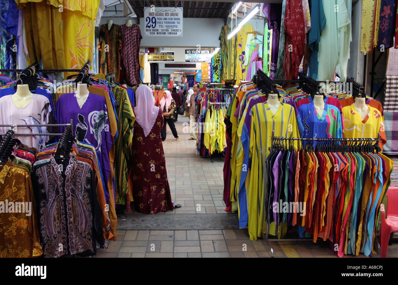 Clothes and textile shop at Payang Market in Kuala Terengganu, Malaysia ...