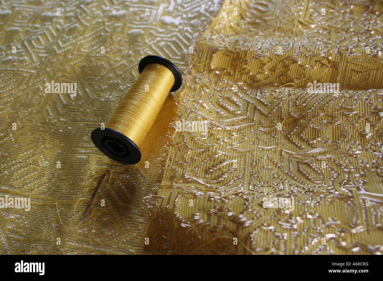 Silk with gold thread hi-res stock photography and images - Alamy