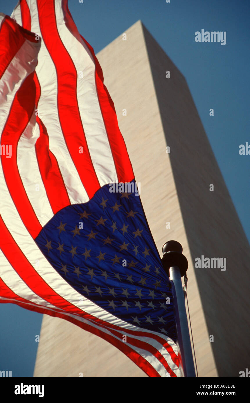 The Stars and Stripes flies at the base of the Washington Monument in ...