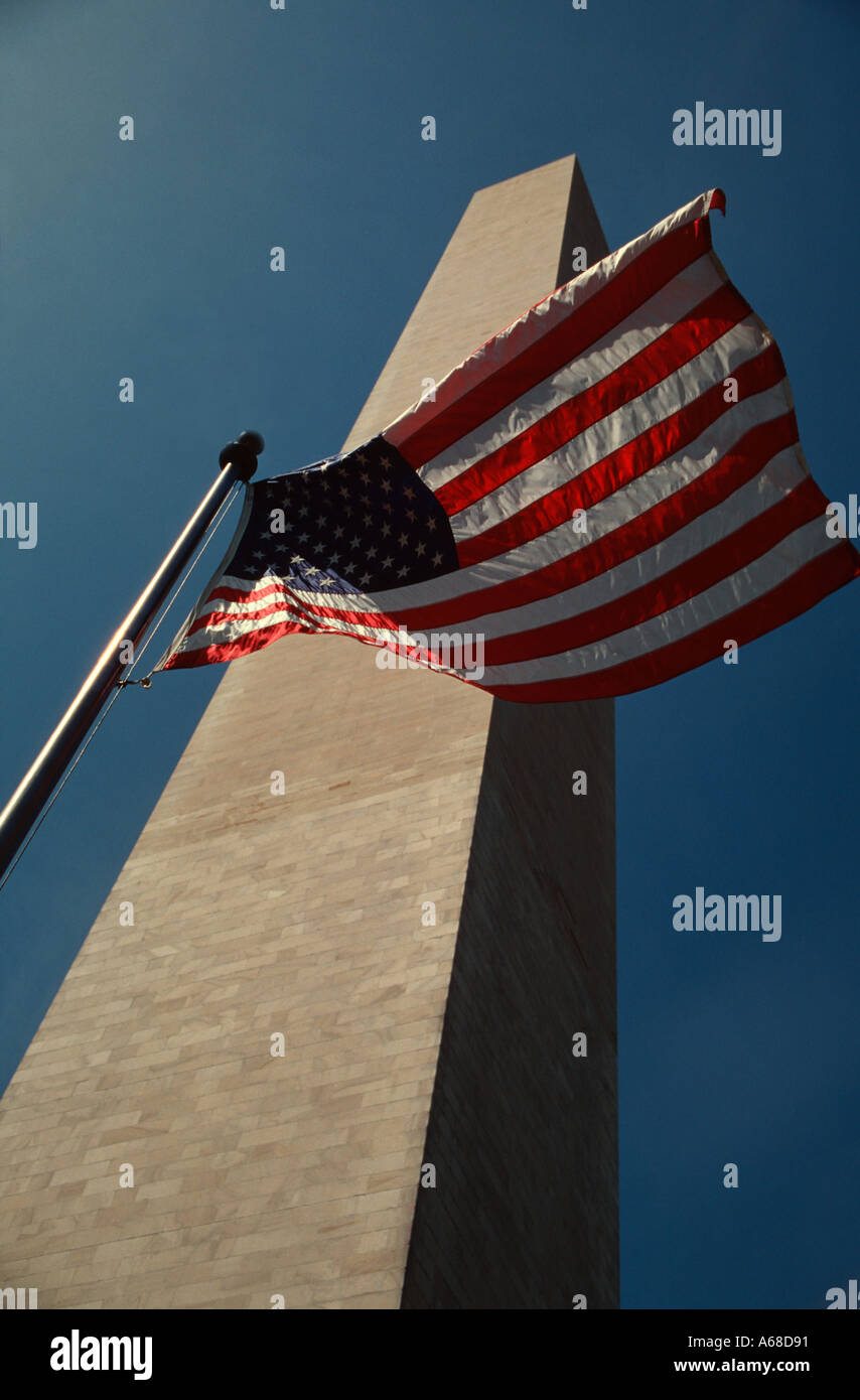 The Stars and Stripes flies at the base of the Washington Monument in ...