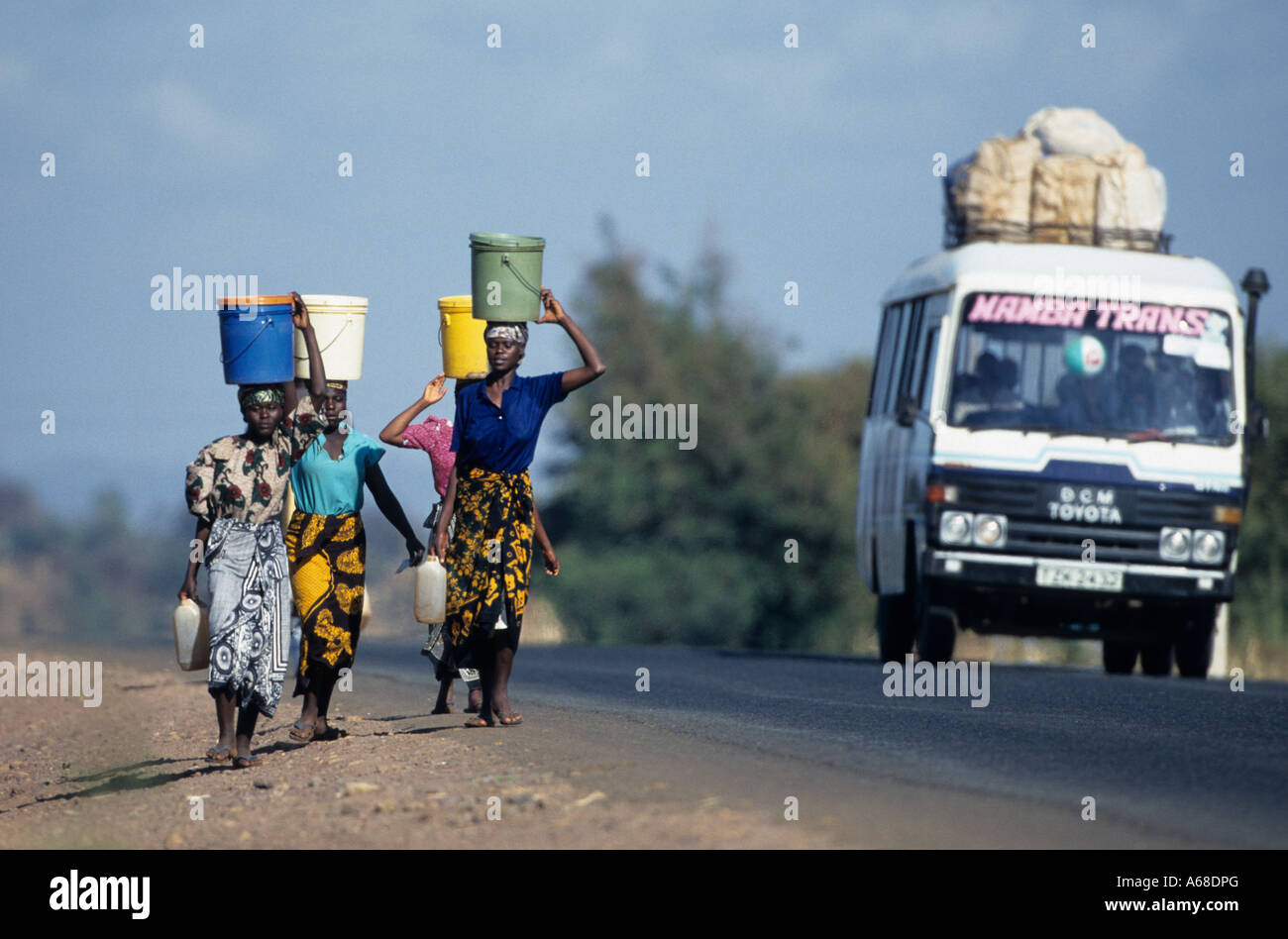 Fetching water buckets hi-res stock photography and images - Alamy