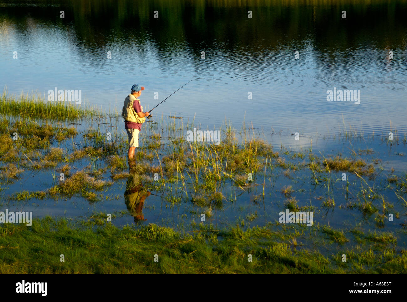 Man fishing Mill Pond, Orleans, Cape Cod, MA, USA Stock Photo - Alamy