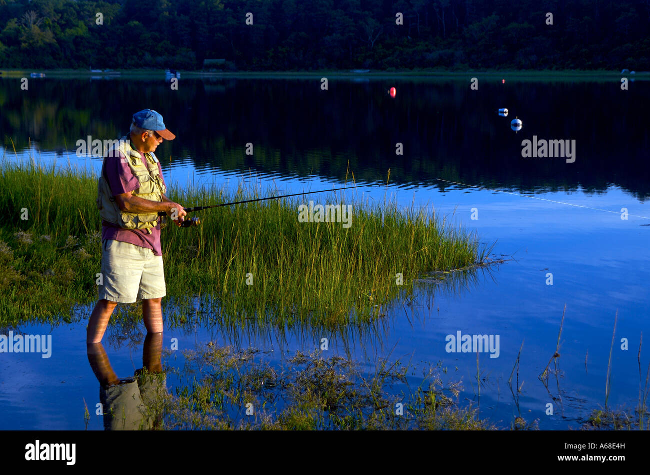 Man fishing Mill Pond Orleans Cape Cod MA Stock Photo - Alamy