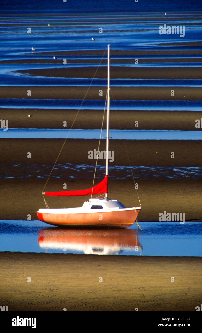 Sailboat anchored in tidal flats Eastham Cape Cod Bay Stock Photo - Alamy