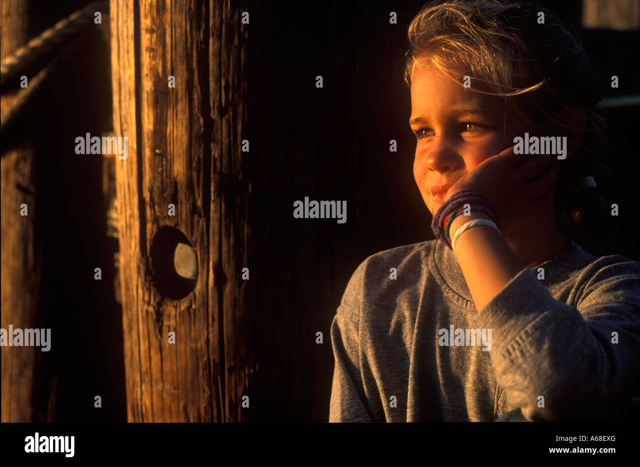 Reflective young girl Stock Photo - Alamy