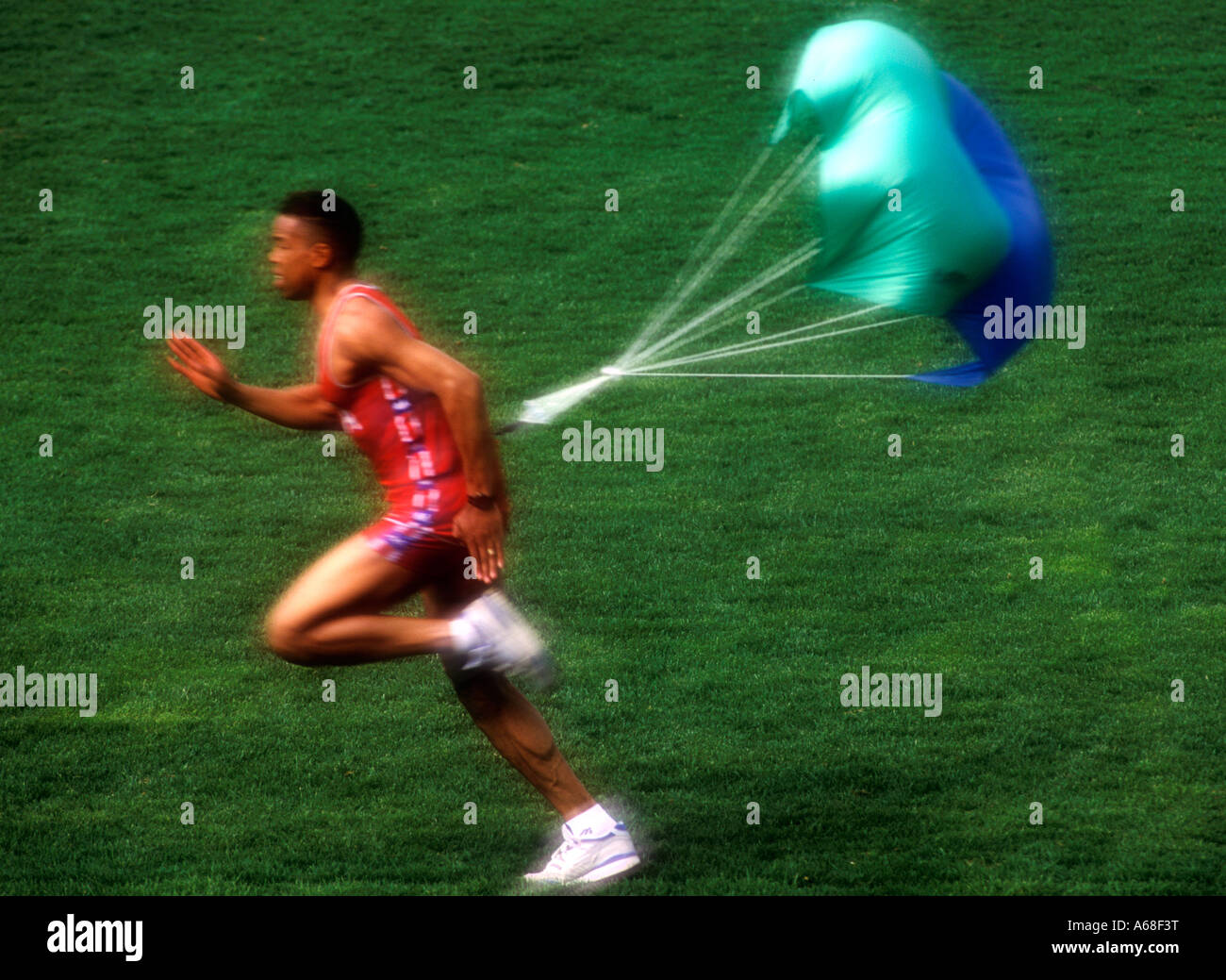 Sprinter doing resistance training Stock Photo - Alamy