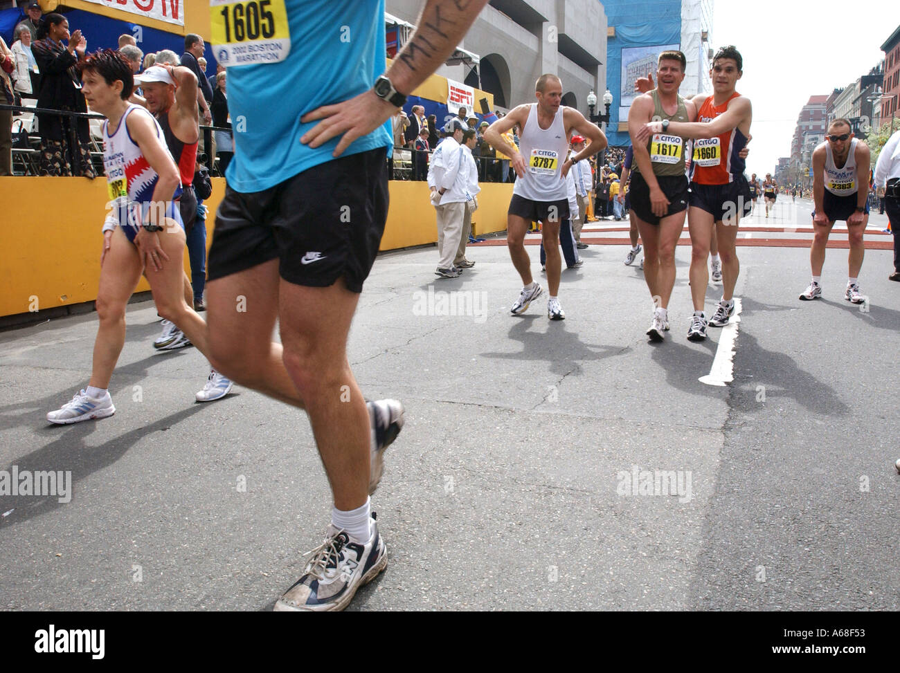 Runners cross the finish line of the Boston Marathon Stock Photo - Alamy