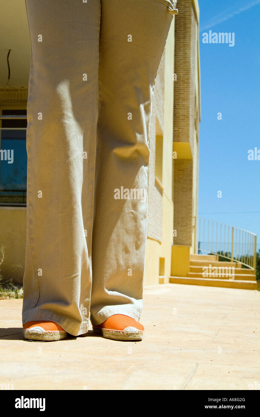 Close up of owner's feet at home's entranceway Stock Photo - Alamy