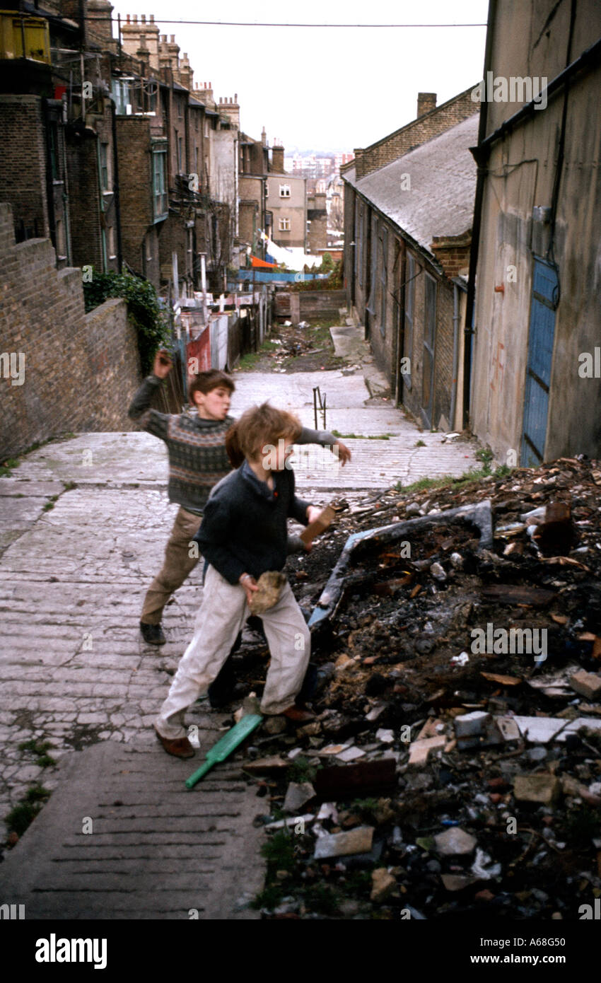 Group of young local kids playing on rubble site near their home Stock ...