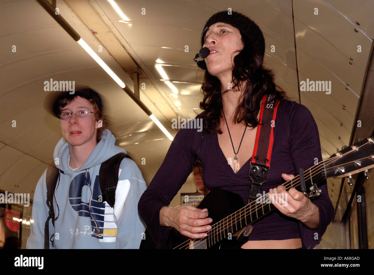 Female singing busker hi-res stock photography and images - Alamy
