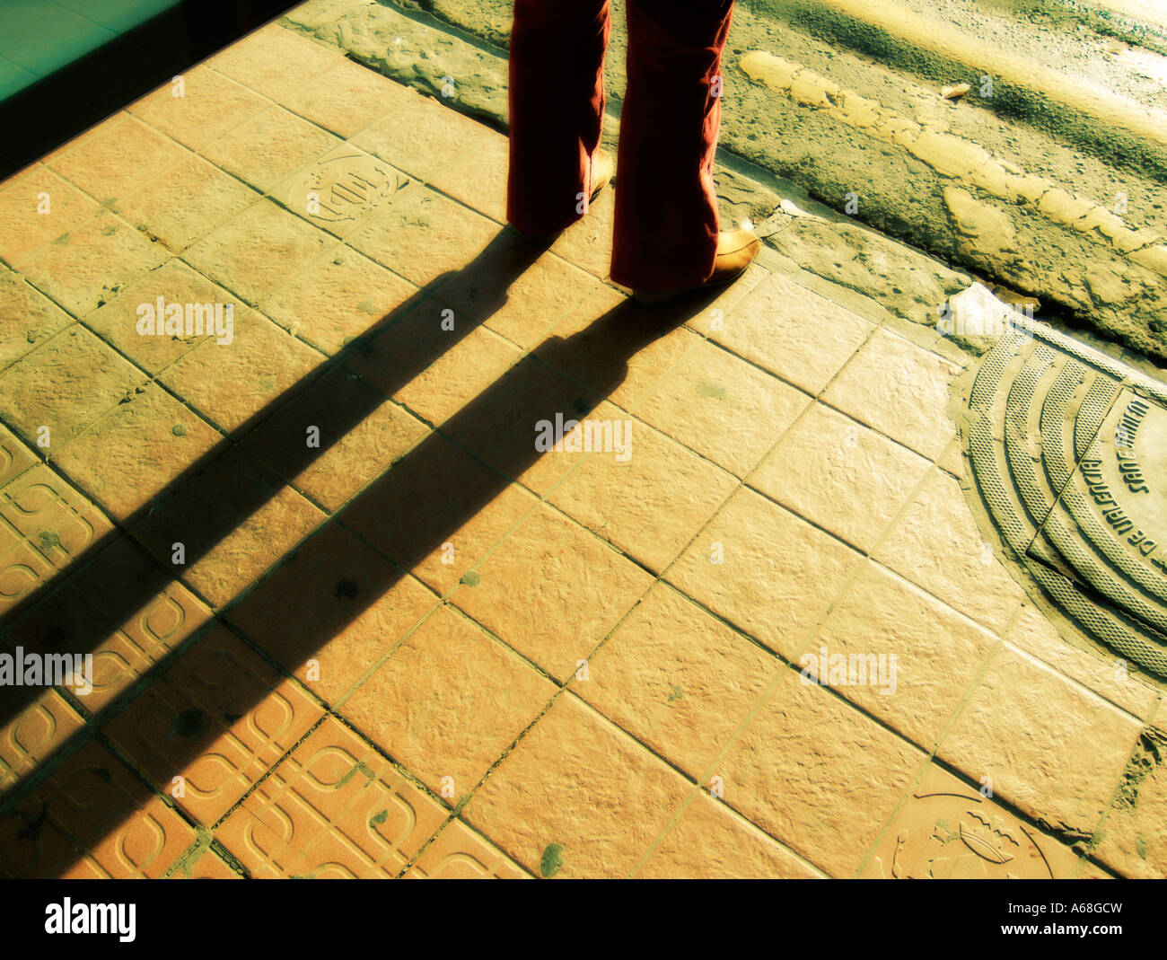 Detail of pedestrian's feet waiting on the pavement's border Stock ...