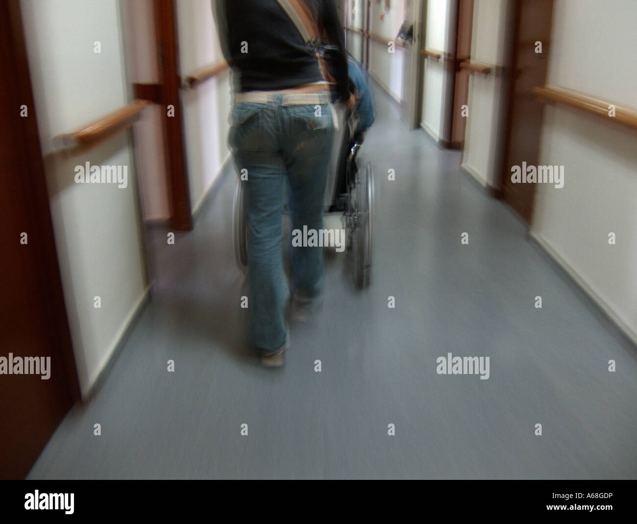 Girl pushing furniture hi-res stock photography and images - Alamy