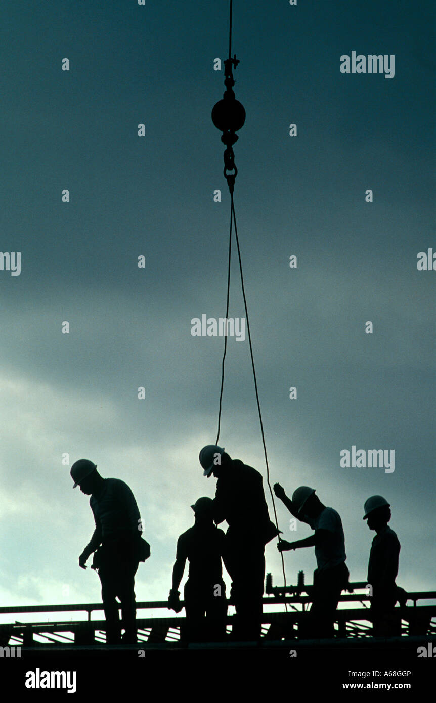 Construction worker building a bridge Stock Photo - Alamy