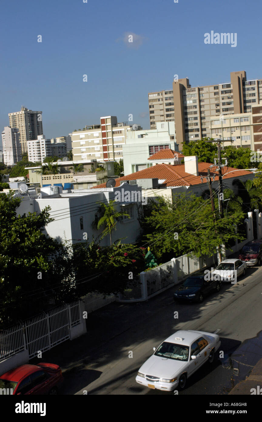 USA Puerto Rico View from above a city street with a taxi below and ...