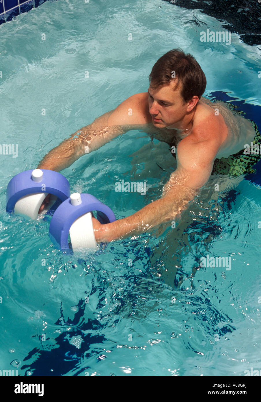 Patient engages in hydro therapy as part of his physical rehabilitation ...