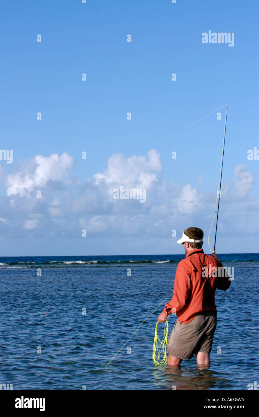 British Virgin Islands Caribbean Man looking for bone fish while salt ...