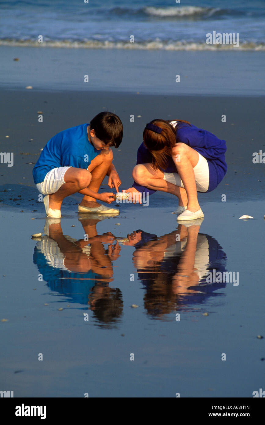 Girls Gathering Shells High Resolution Stock Photography and Images - Alamy