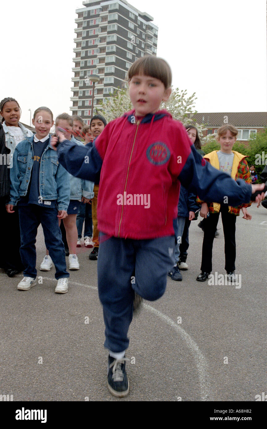 Primary school playground children skipping hi-res stock photography ...