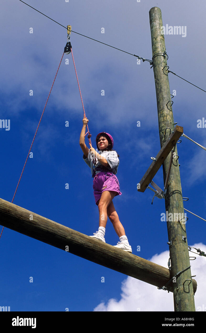 Woman on a confidence course station Stock Photo - Alamy
