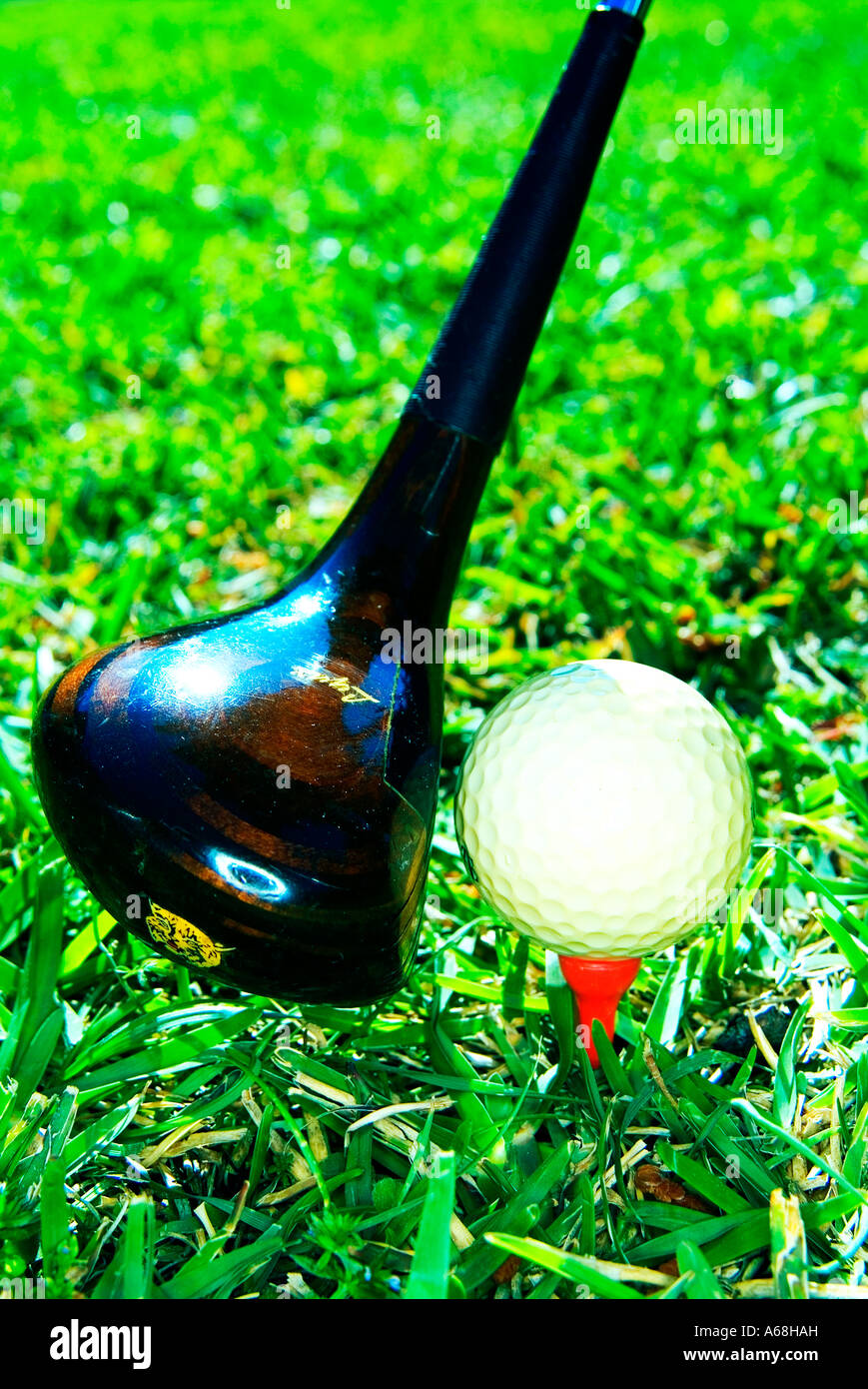 Golf ball and club Stock Photo - Alamy