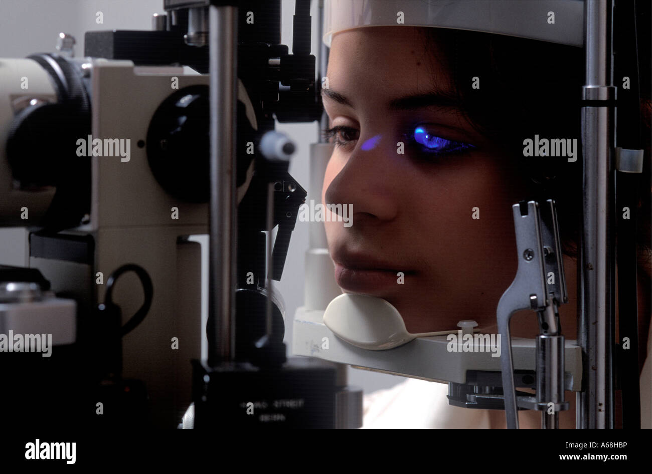 Woman having an eye exam Stock Photo - Alamy