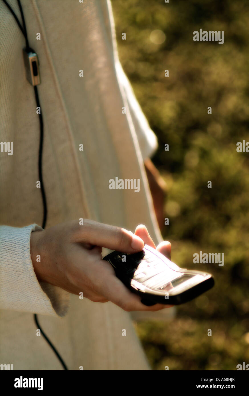 Woman looking for information on internet by a cellular phone Stock ...