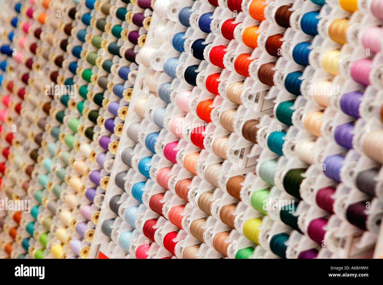Thread selection in a fabric store Stock Photo - Alamy