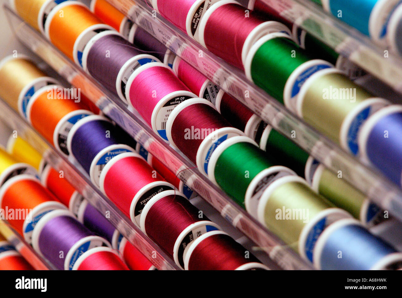Thread selection in a fabric store Stock Photo - Alamy