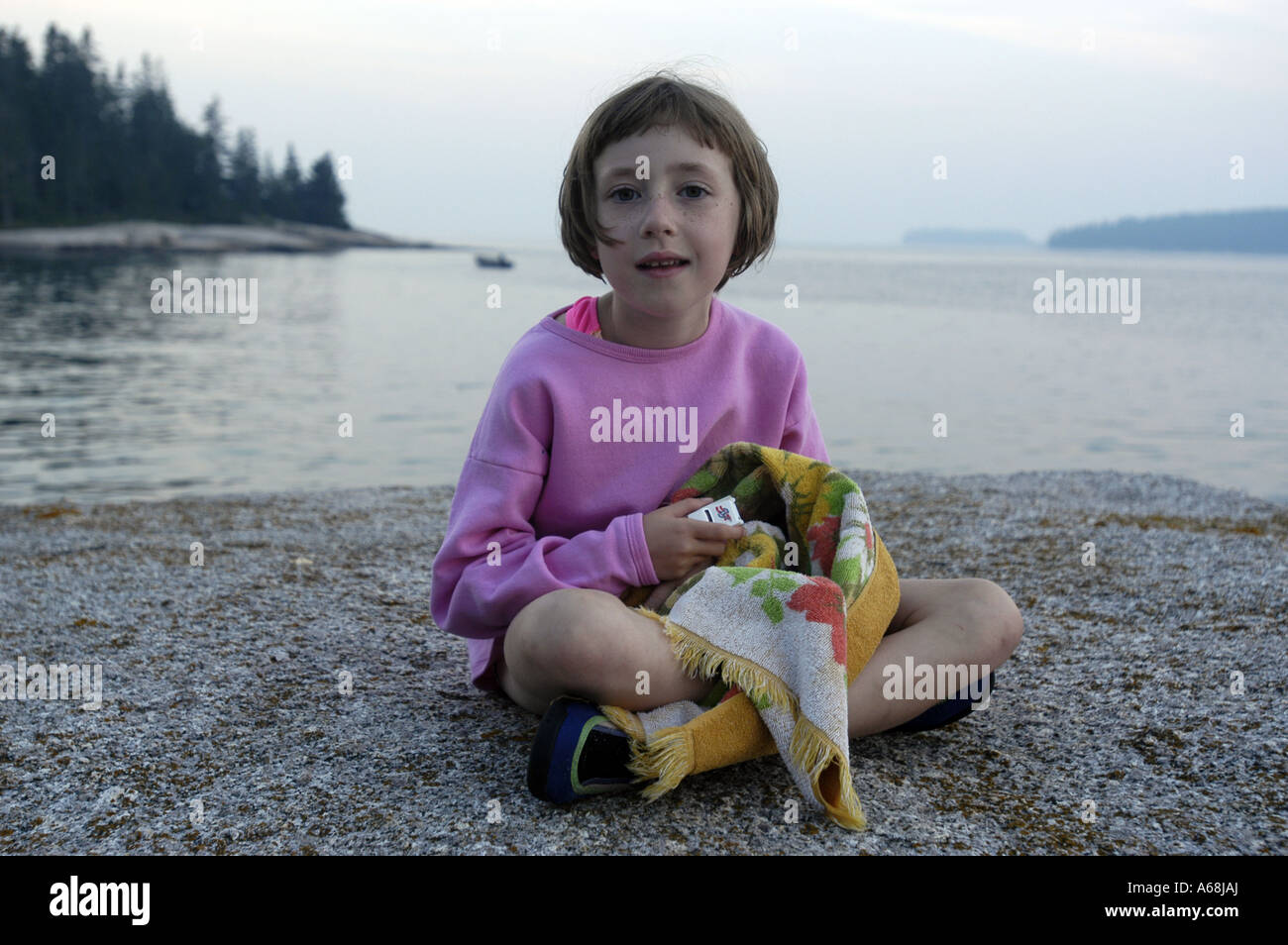 Children on rocks Deer Isle Maine Stock Photo - Alamy