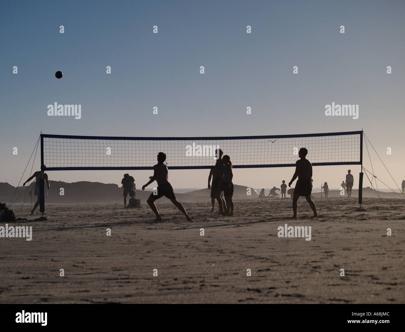 Beach Volleyball in the evening on Camps Bay Beach in Capetown South ...