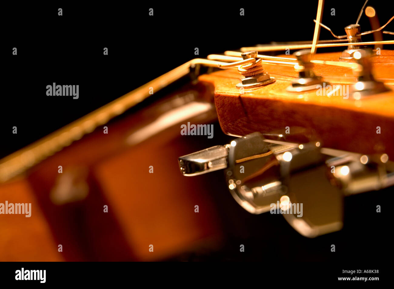 Acoustic guitar head and tuning keys close up Stock Photo - Alamy