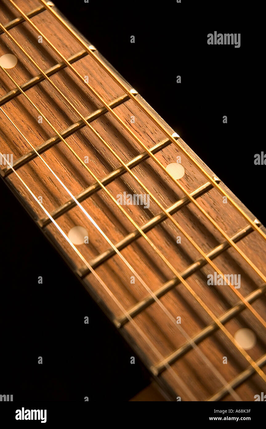 Acoustic guitar fretboard and strings Stock Photo - Alamy