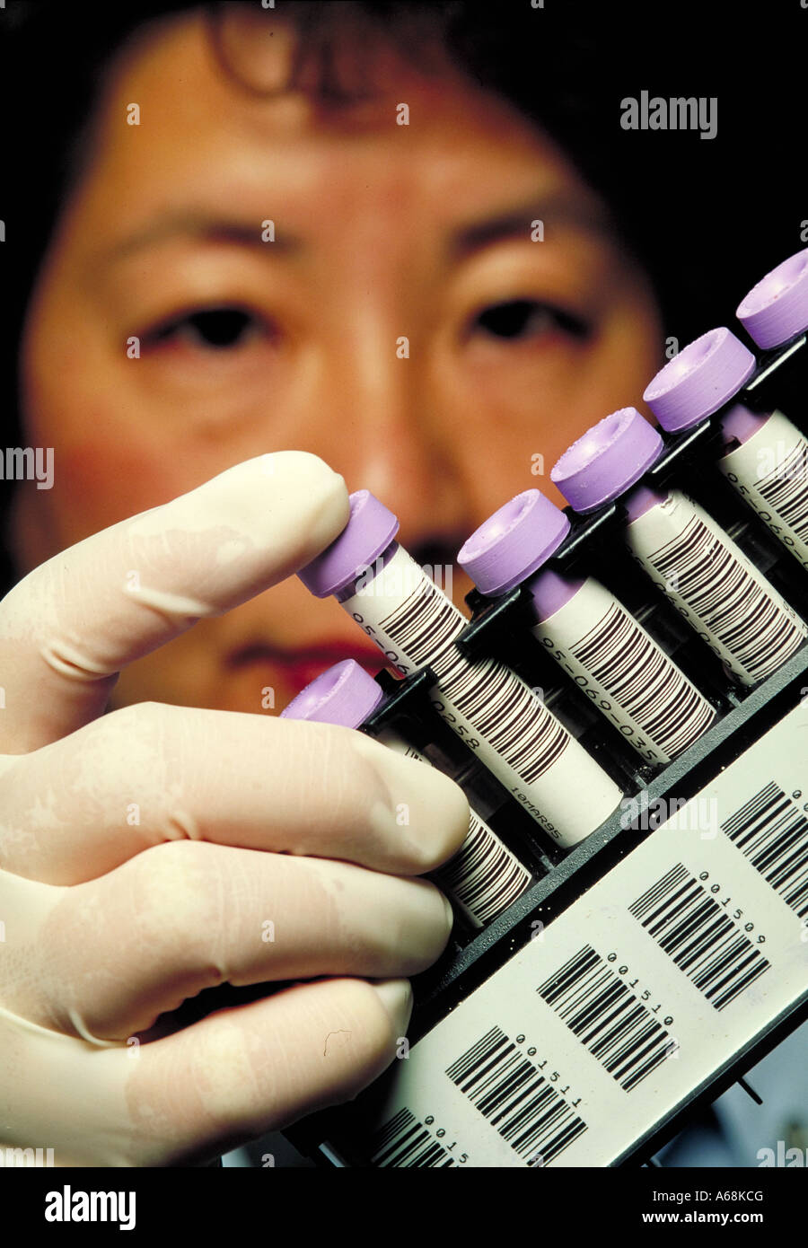 Lab technician with blood samples Stock Photo - Alamy