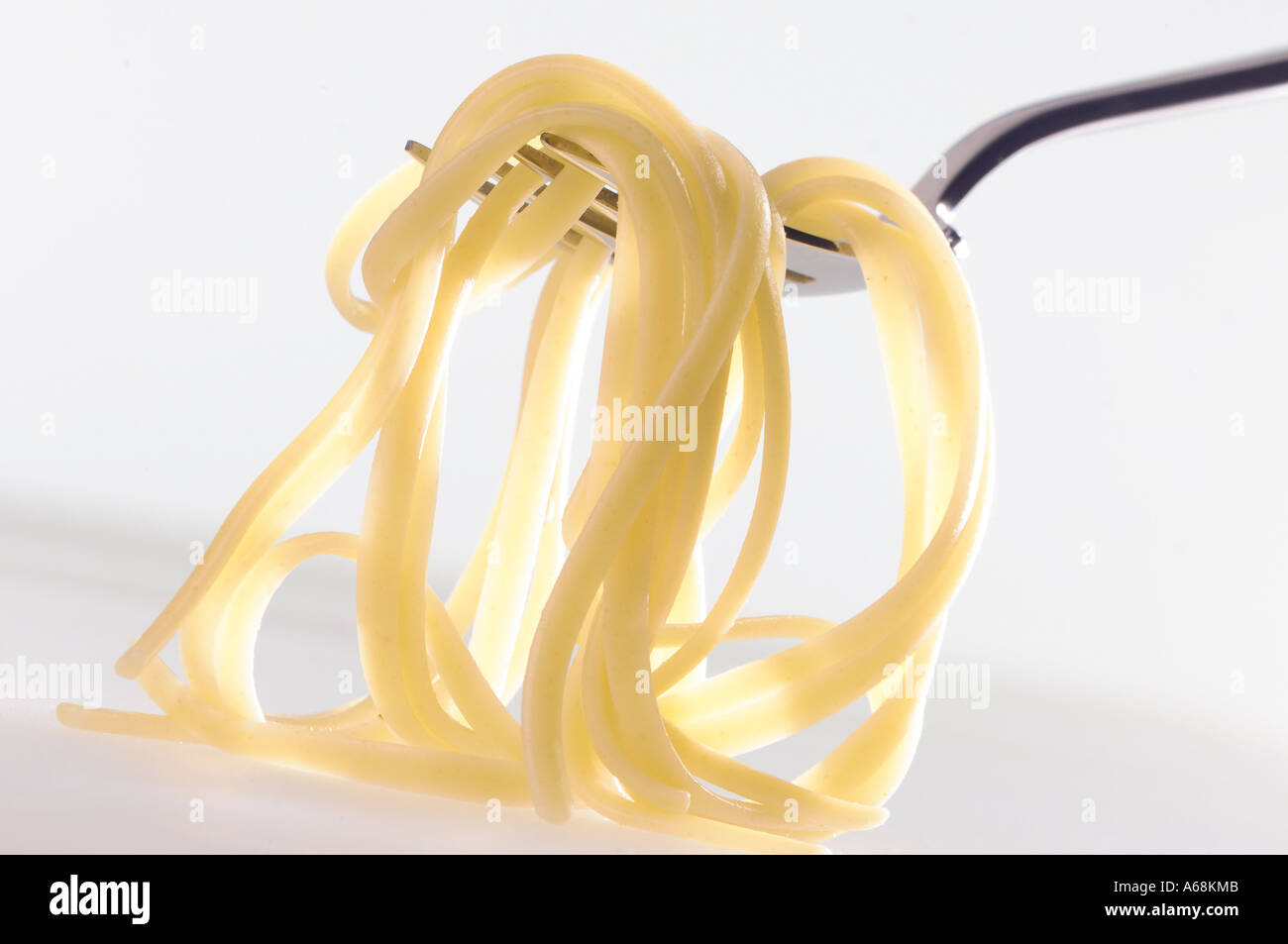 pasta on fork Stock Photo - Alamy