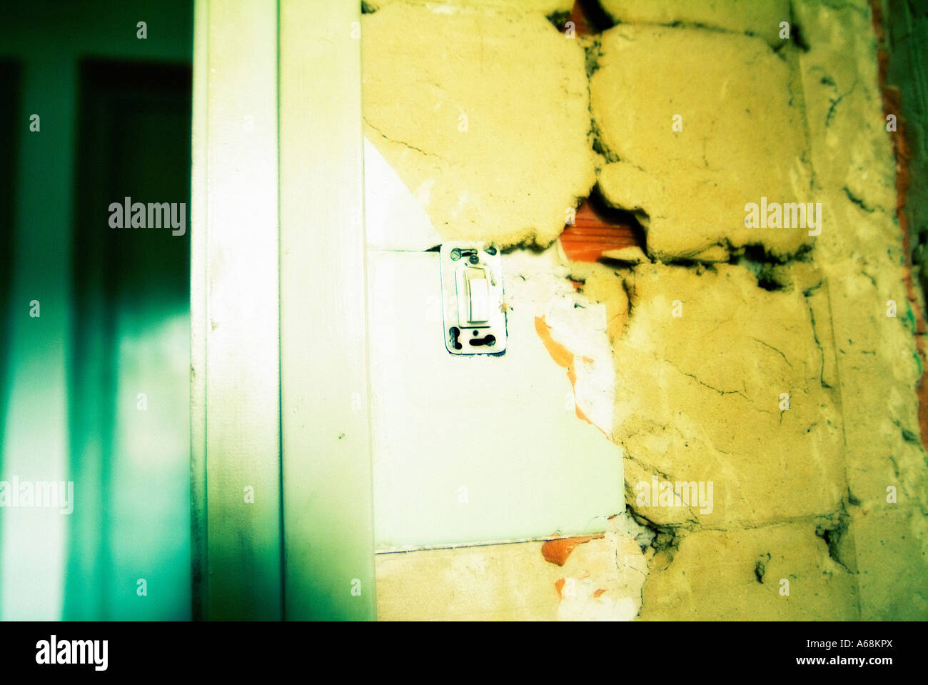 An electric switch on a destroyed wall Stock Photo - Alamy