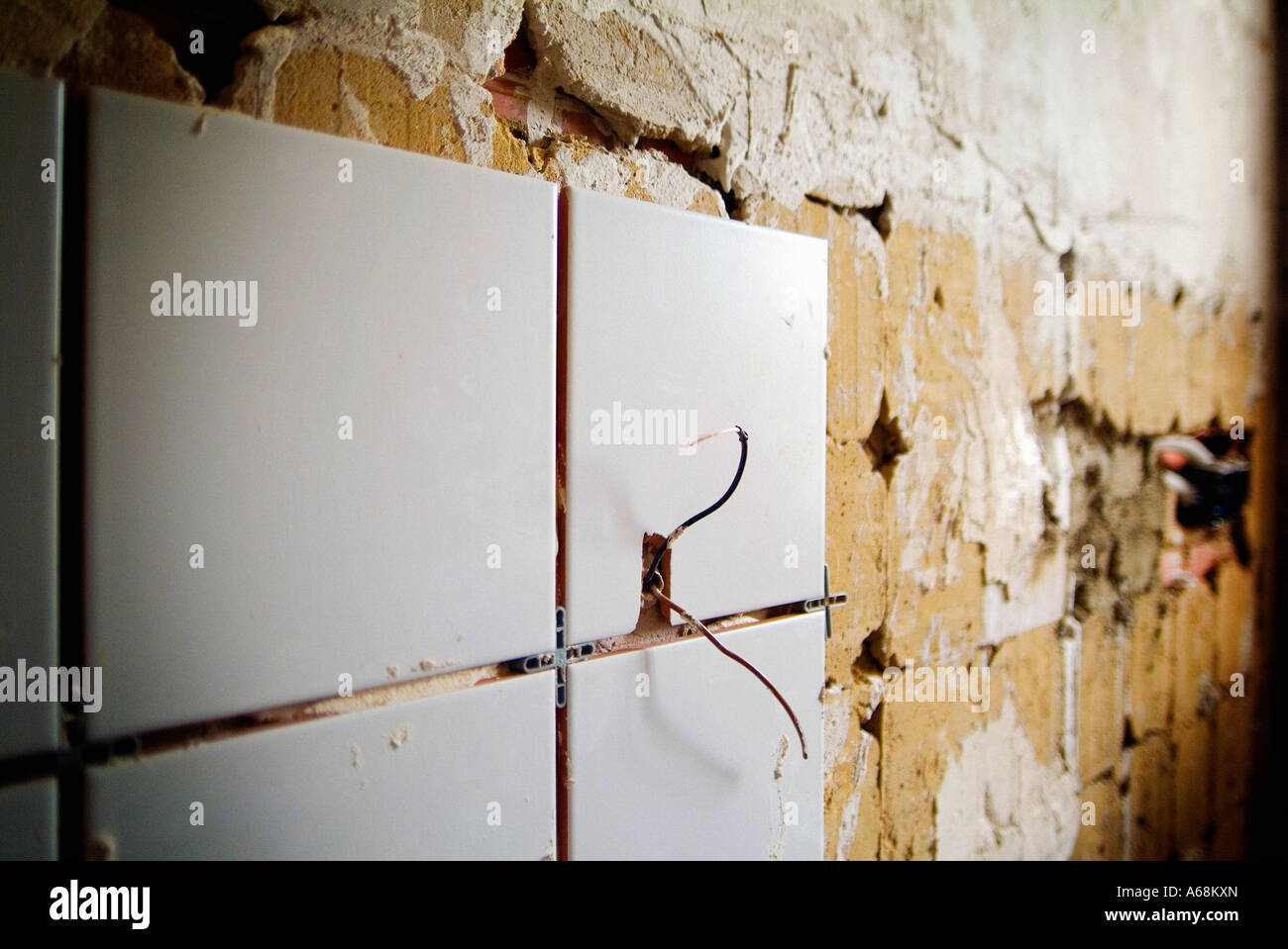 A wall under refurbishment Stock Photo - Alamy