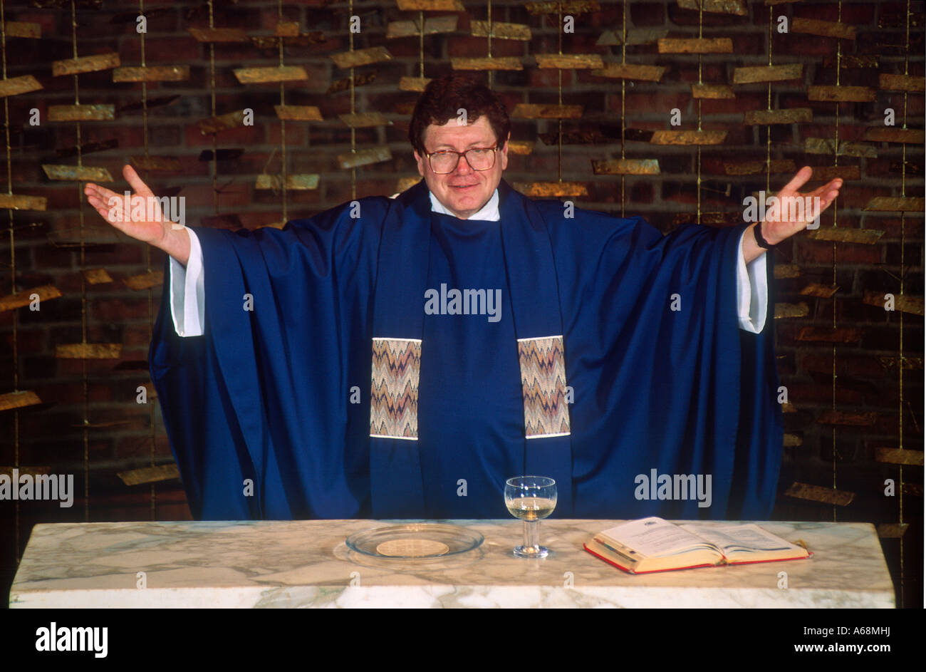 Priest celebrating mass Stock Photo - Alamy