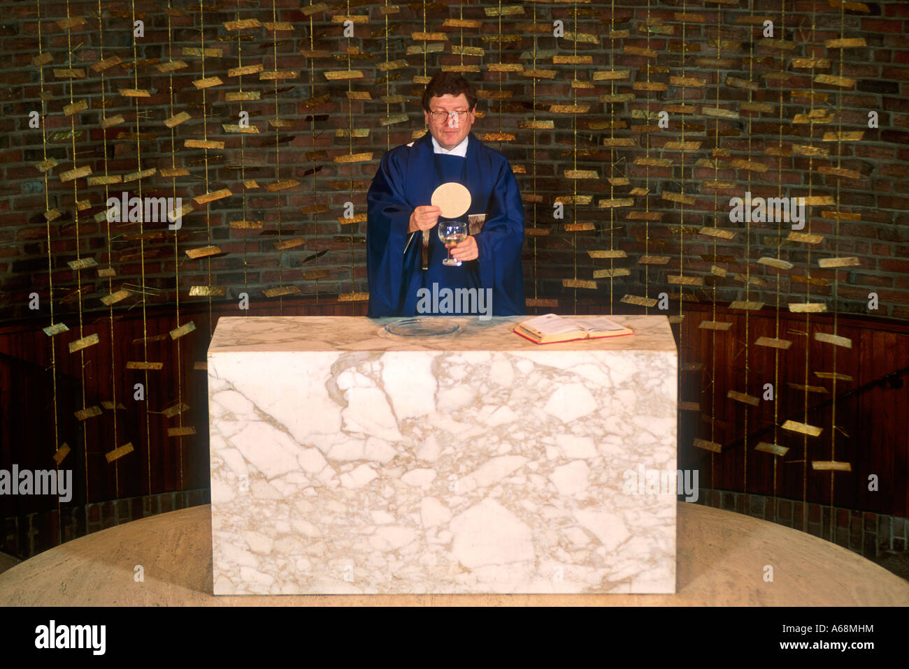 Priest celebrating mass Stock Photo - Alamy
