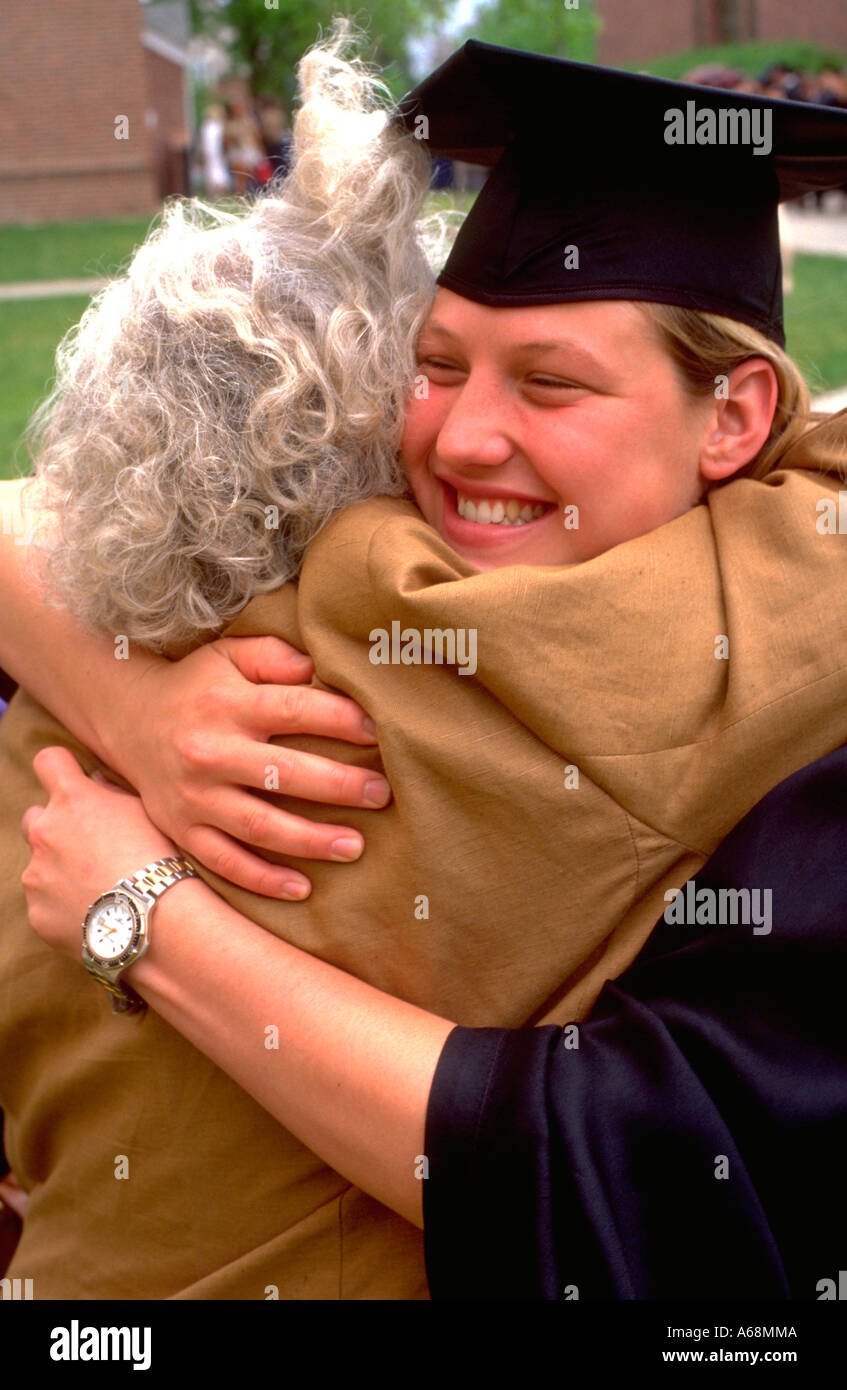 Big hug from mom after Macalester College graduation age 22 and 58. St ...