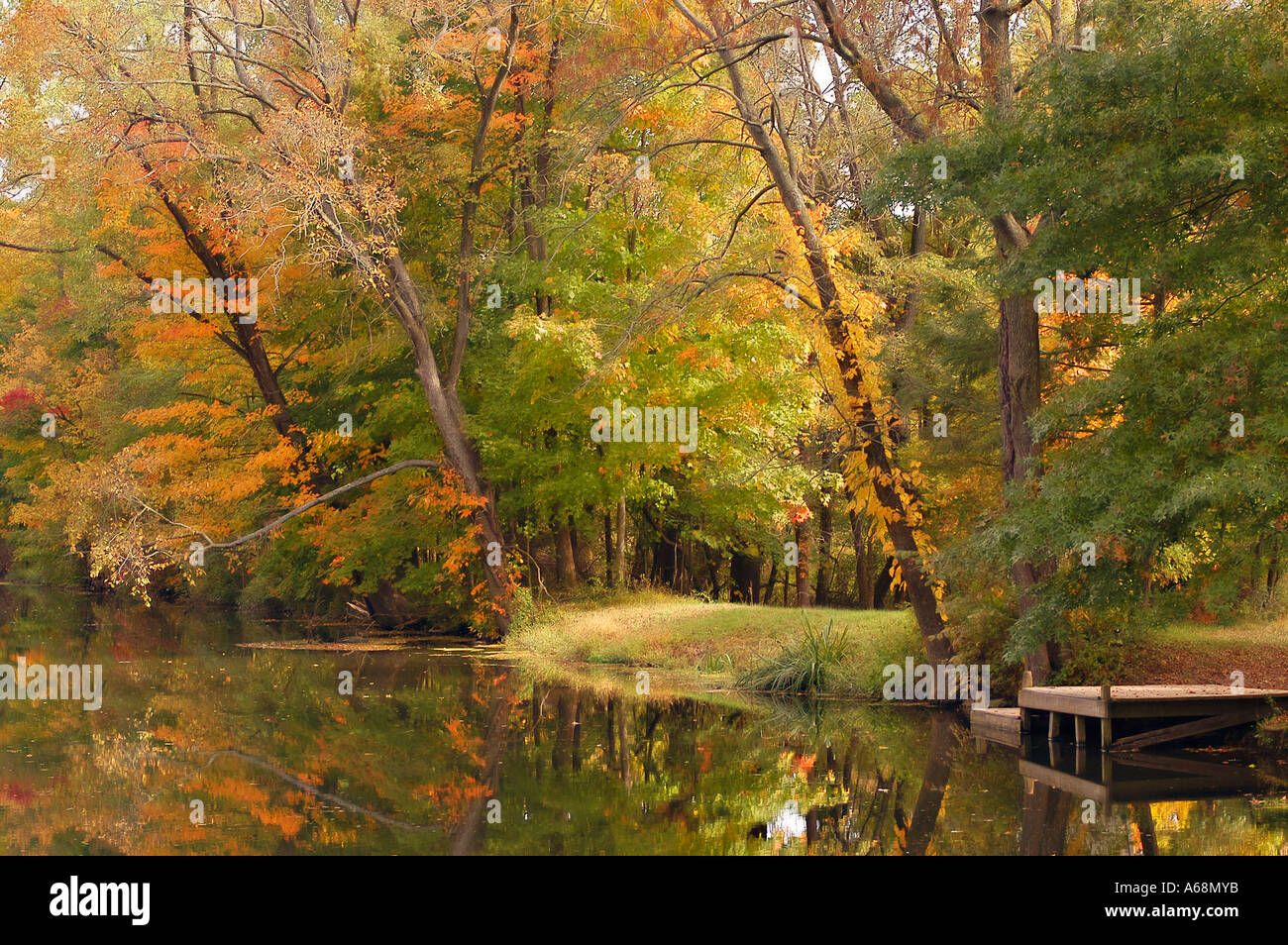 Sunlit water channel Stock Photo - Alamy