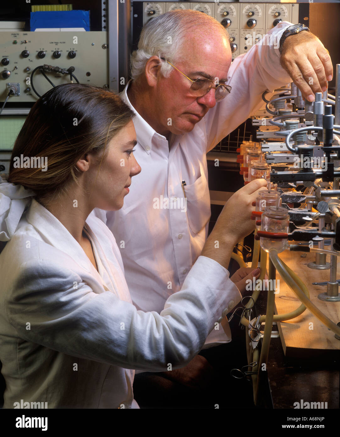 Research scientist conducting an experiment Stock Photo - Alamy
